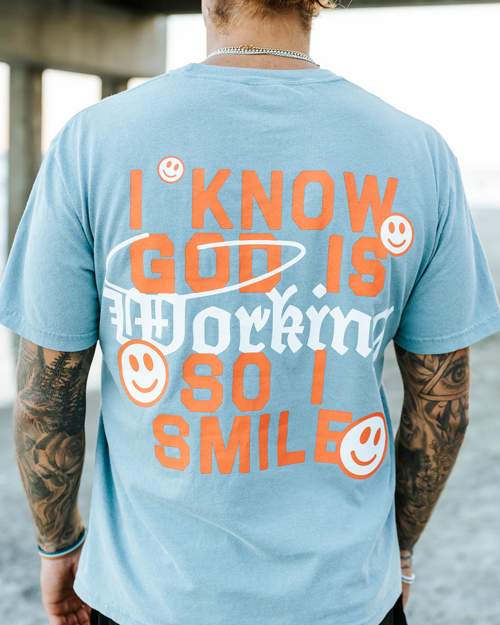 So I Smile Tee – In God We Must