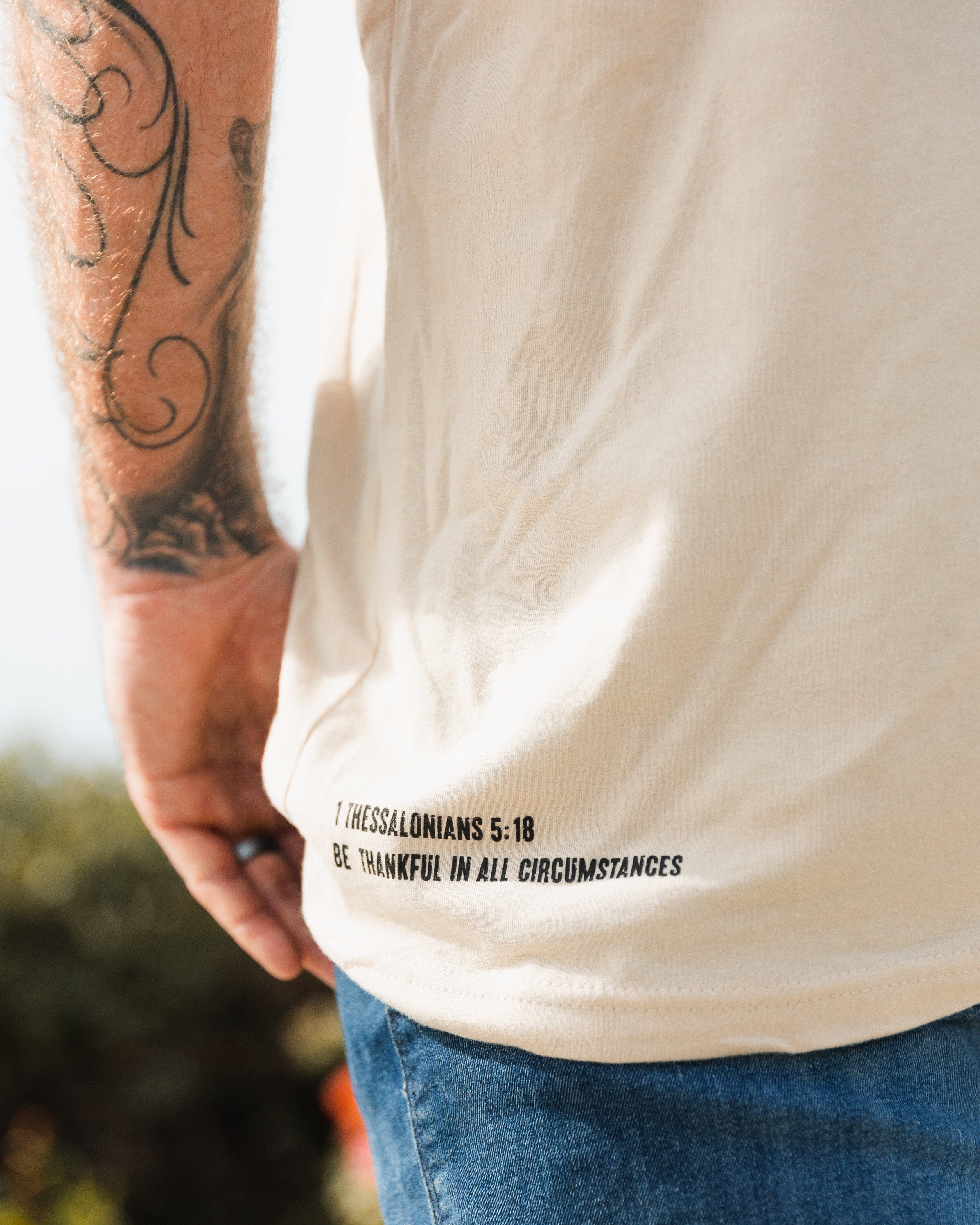 Gratitude Sand Tee – In God We Must